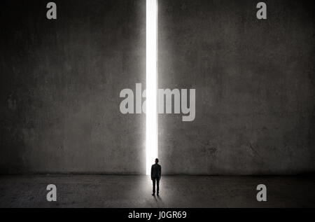 businessman in front of the huge gate Stock Photo - Alamy