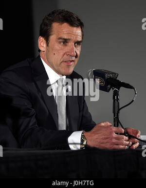 Vegas Golden Knights general manager George McPhee listens during a ...