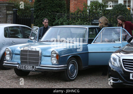 Kate Moss leaves her North London home with her driver carrying what ...