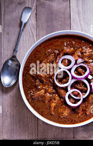 Mexican red mole with chicken, rice and beans Stock Photo - Alamy