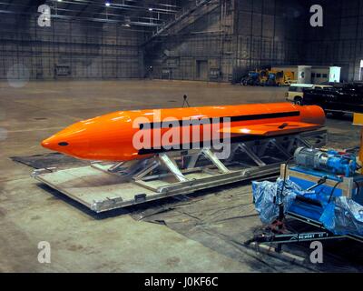 A U.S. Air Force Massive Ordnance Air Blast (MOAB) bomb sits on the ...