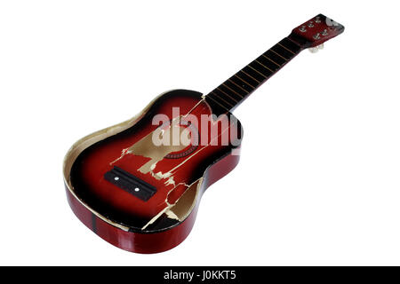A smashed and broken acoustic guitar Stock Photo - Alamy