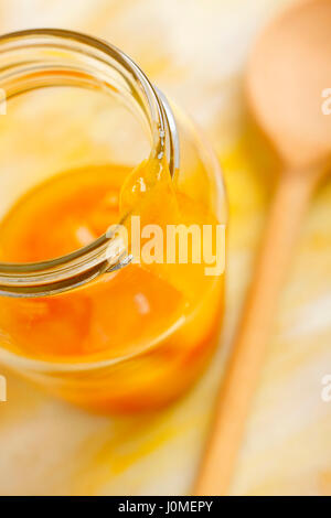 Plum jam or marmalade in a glass jar with plums fruit around Stock ...