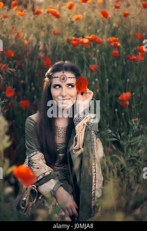 Medieval Princess in a Field of Poppies Stock Photo - Alamy