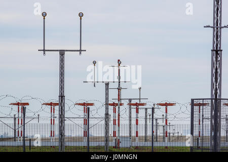 Directional sign markings on the tarmac of runway at a commercial ...