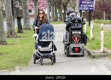 Goth riding Goth themed mobilty scooter. UK Stock Photo - Alamy