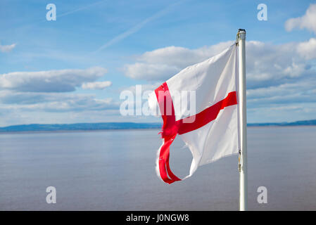 Ragged and torn flag of St George, the English flag - symbol of decay ...