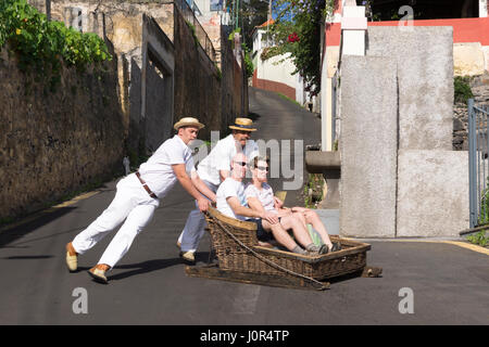 Toboggans or wicker sledges or baskets, Funchal, Madeira Stock Photo ...