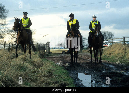 British Police officers patrolling rural area of Suffolk and talking to ...