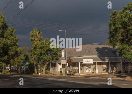 DE RUST, SOUTH AFRICA - MARCH 23, 2017: A street scene in De Rust, a ...