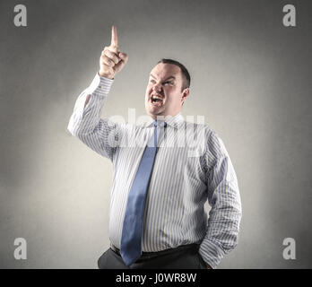 Fat man yelling Stock Photo - Alamy