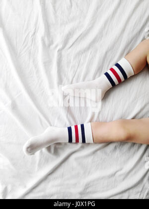 crumpled socks on white background Stock Photo - Alamy