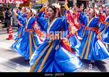 Hinokuni Yosakoi Dance Festival. Women team in blue and red yukata ...