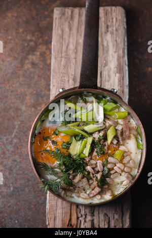 Top view of brown eggs in white bowl isolated on blue, banner Stock ...