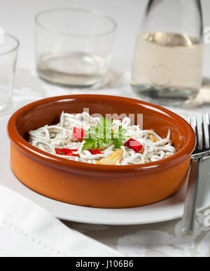 Baby eels, gulas or elver substitute with clams in garlic sauce ...