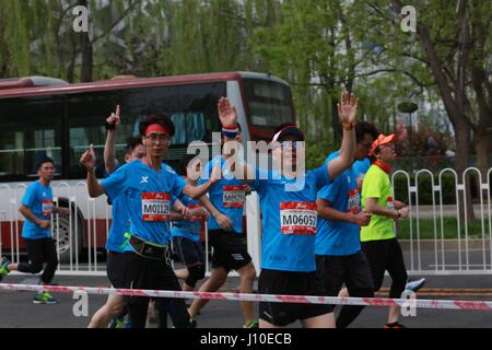 Beijing, China. 17th Apr, 2017. More than 21,000 runners from about 20 ...