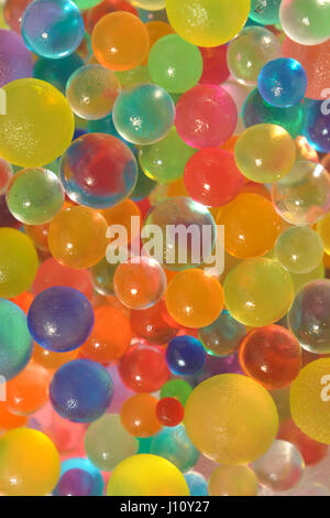 Background made with scattered color gel balls Stock Photo - Alamy