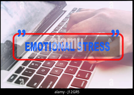 Hand and text EMOTIONAL STRESS with vintage background. Technology ...