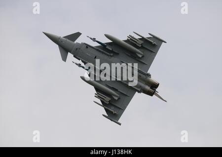 Eurofighter Typhoon plane with full weapons load displays its agility ...