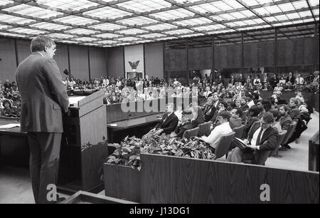 A military administrative official addresses employees during a ...