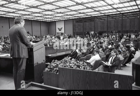 A military administrative official addresses employees during a ...