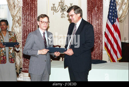 man accepting award taking a picture Stock Photo - Alamy