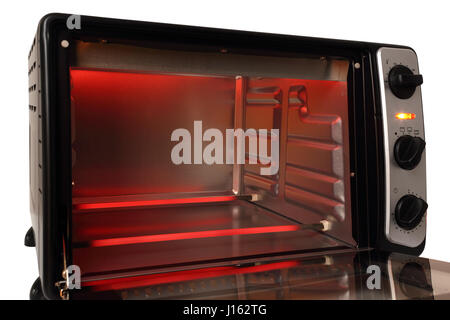 Glowing red, hot, electric range cooktop burner heating element coil ...