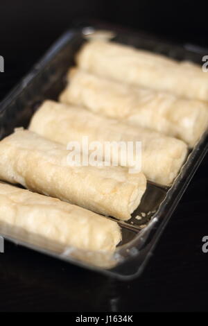 Spring roll in disposable plastic tray Stock Photo - Alamy