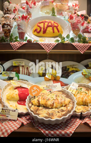 Fake plastic food on a restaurant display vitrine. Showing the food in ...