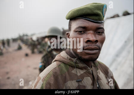 A DRC national army (FARDC) soldier at a checkpoint on the frontline ...