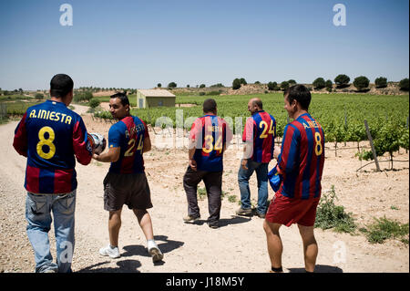 Workers of Iniesta Winery which belongs to Football Club Barcelona ...