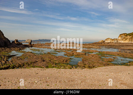 Low tide on a northwestern beach in Spain Stock Photo - Alamy