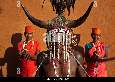 Dancers from the Bison Horn Maria tribe ( India). They are dressed to ...