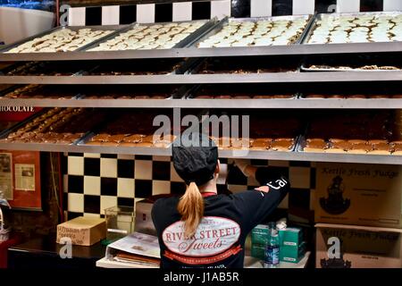 Charleston, South Carolina woman making candy at Savannah's Candy ...