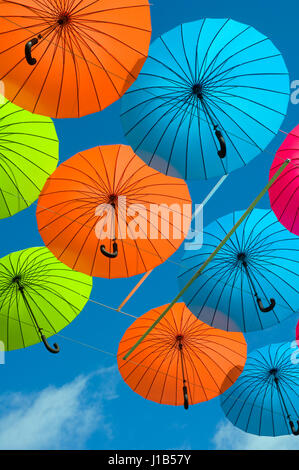 Rows of colourful umbrellas suspended over court yard in Toronto ...