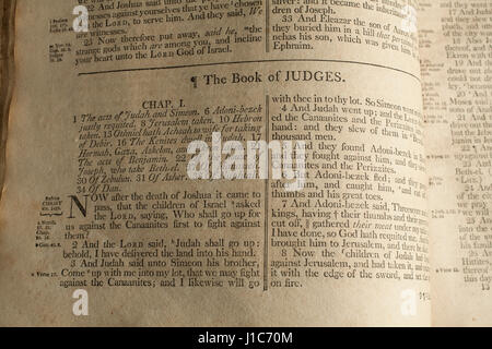 The book of Judges in a 200 year old bible, old testament Stock Photo ...