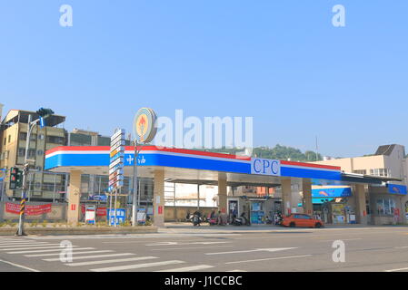 People buy petrol at CPC petrol station in Taichung Taiwan. CPC is a ...