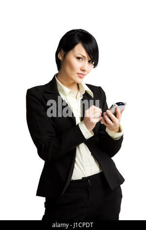 Beautiful Asian businesswoman working with a PDA on white background ...
