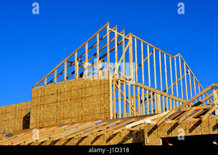 New wood frame homes under construction Stock Photo - Alamy