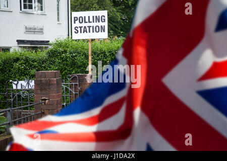 polling station sign and Union Jack flag - UK prepares for elections ...