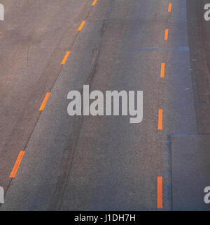 summer asphalt road in perspective with signs and markings, green ...