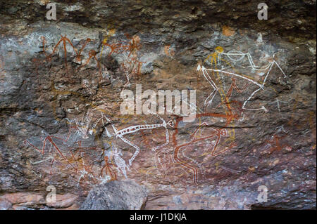 Aboriginal Rock Art of people dancing at Kakadu National Park, Northern Territory, Australia ...