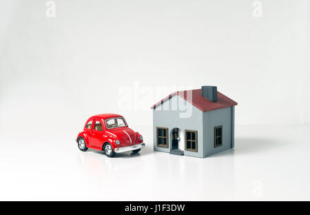 Izmir, Turkey - April 1, 2017: Red toy car and miniature house on a ...