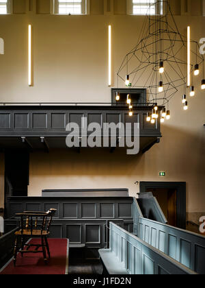 Courtroom interior, close-up. Bench for the accused in the courthouse ...