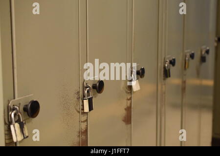 Beige lockers in locker room Stock Photo - Alamy