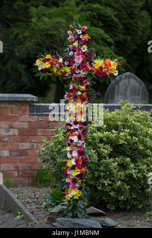 Easter Cross Decorated with Flowers Stock Photo - Alamy