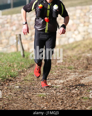 Runner legs outside during autumn day Stock Photo - Alamy