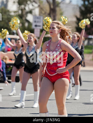 High school cheerleader marching in street parade - USA Stock Photo - Alamy