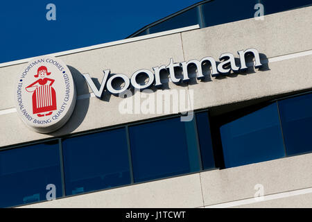 A logo sign outside of the headquarters of Voortman Cookies Limited in ...