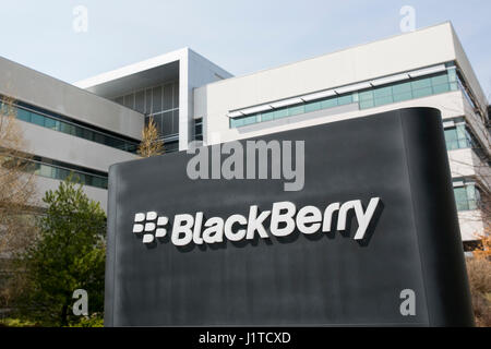 A logo sign outside of the headquarters of BlackBerry Limited, in Stock ...
